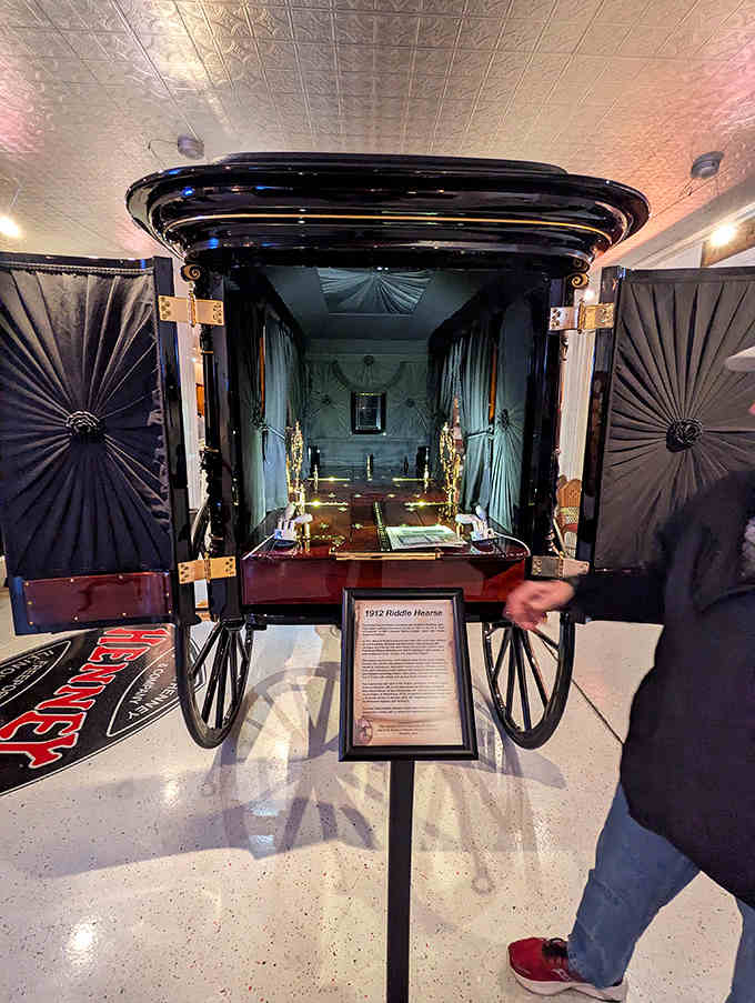 Peek inside this vintage hearse to appreciate the meticulous interior detailing &ndash; those brass fittings and velvet curtains weren't just practical, they were art.