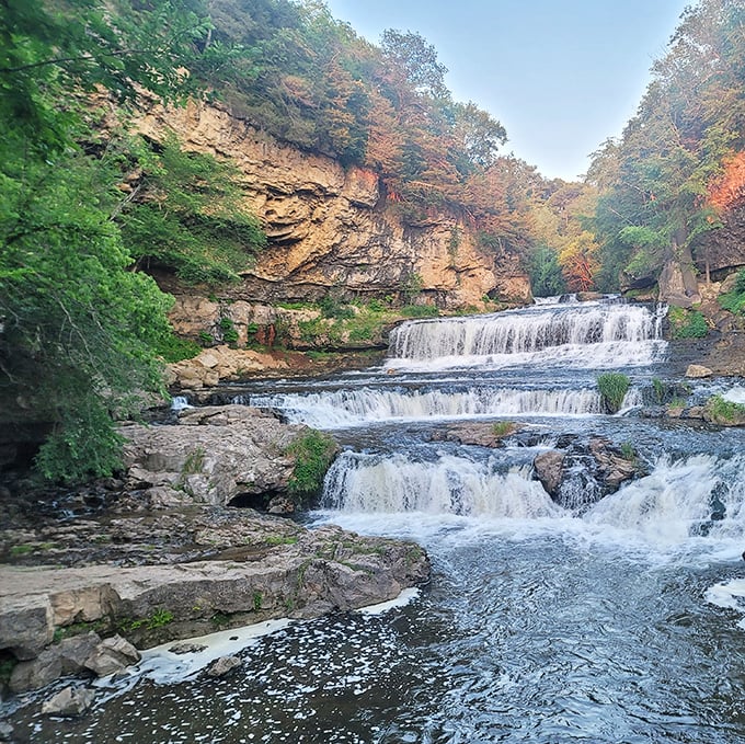 Willow Falls in full force creates a three-tiered spectacle, with water dancing over ancient rock formations sculpted by centuries of persistent flow.