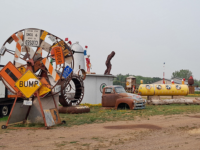 A roadside wonderland of repurposed signs and farm equipment creates an unexpected art installation that stops traffic and starts conversations.