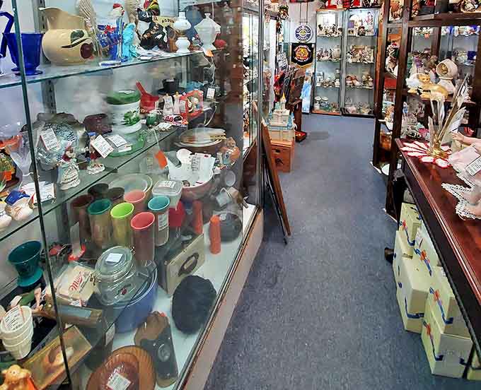 Narrow passages between glass cases create an intimate treasure hunt experience &ndash; your next favorite find might be hiding just around the corner.