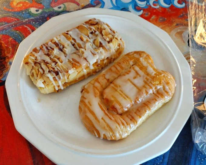 Danish pastries that shatter with buttery precision &ndash; the kind that leave evidence on your shirt but you're too happy to care.