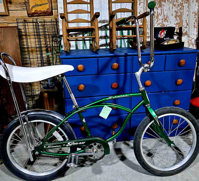 That green Schwinn Sting-Ray isn't just a bicycle; it's every summer freedom ride of childhood, banana seat and all.