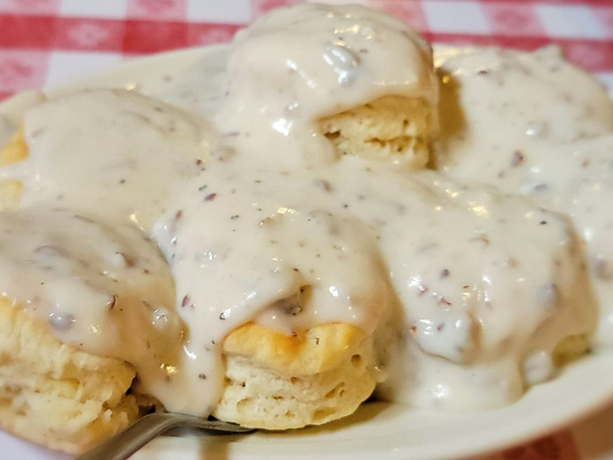 Biscuits swimming in creamy, peppery gravy &ndash; comfort food that wraps around your soul like a warm flannel blanket.