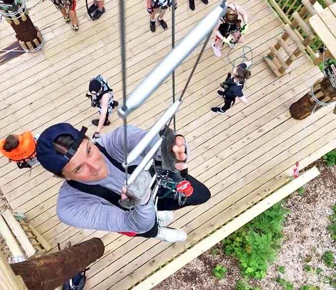 Each obstacle presents a unique challenge, testing different skills while the forest stretches endlessly below.