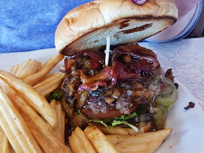 This isn't just a burger &ndash; it's a masterpiece of balance between savory beef, crisp vegetables, and melty cheese that demands to be savored.