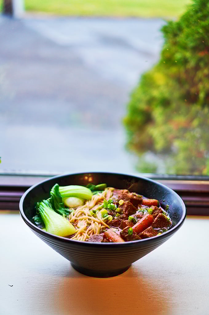 This isn't just soup &ndash; it's a flavor odyssey. Tender beef and fresh bok choy swim in a broth so rich it should probably file its own tax return.