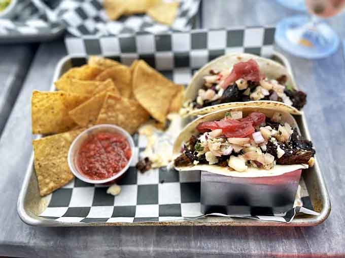 Tender, smoky brisket nestled in soft tortillas with fresh toppings &ndash; proof that Cabana Blue's taco game extends beyond seafood.