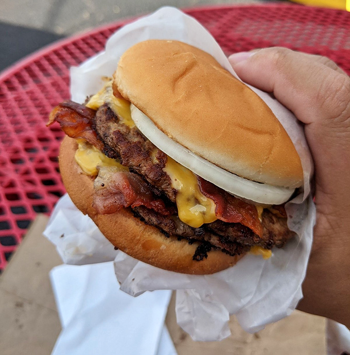 This isn't just lunch – it's edible nostalgia wrapped in paper, with fries that achieve the perfect balance between crispy exterior and fluffy interior.