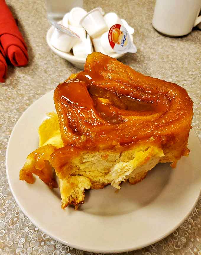 That moment when the fork breaks through the caramel roll's glistening surface – it's like the dessert equivalent of cracking into crème brûlée.