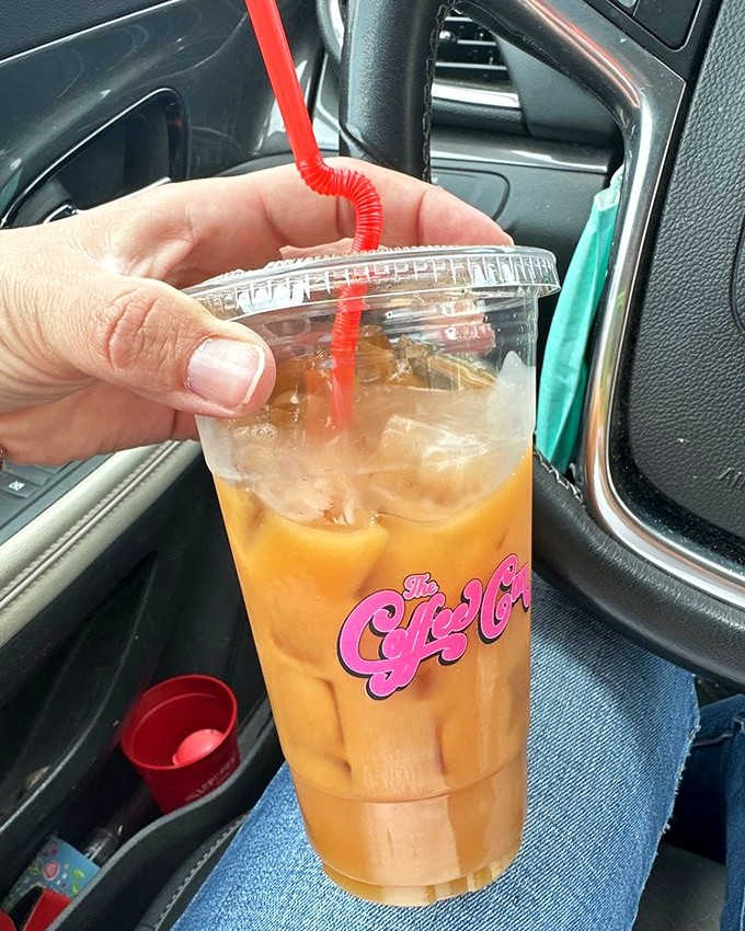 Caramel swirls dance through cold brew like a caffeinated ballet &ndash; this isn't just coffee, it's performance art in a plastic cup.
