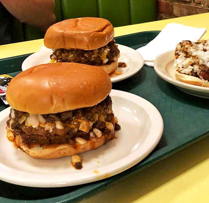 These aren't dainty burgers – they're two-handed commitments topped with that magical meat sauce that defines Duluth comfort food.