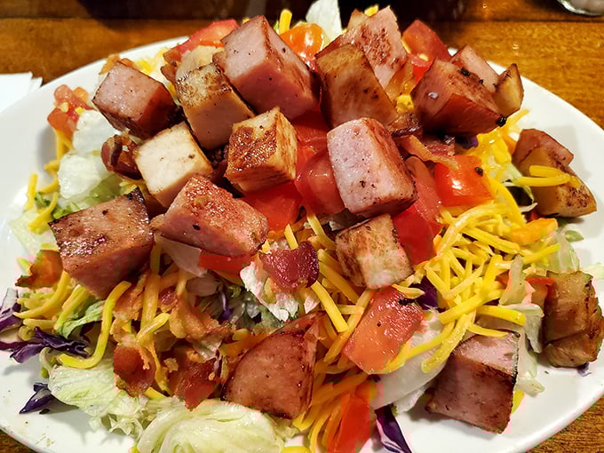 This isn't your sad desk salad &ndash; the club salad comes loaded with ham, turkey, and cheese, proving that even in salad form, The Mouse doesn't believe in skimping on portions.