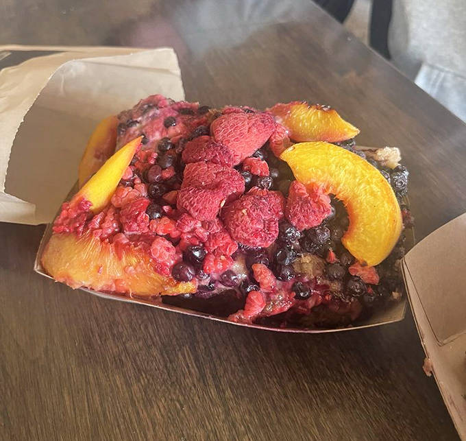 Coffee cake topped with fresh fruit and streusel, because sometimes you need to feel healthy while indulging.