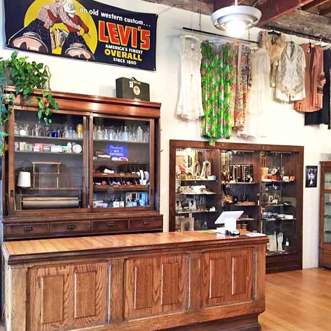 This authentic vintage pharmacy counter now serves as command central, where knowledgeable staff share their encyclopedic fashion wisdom.