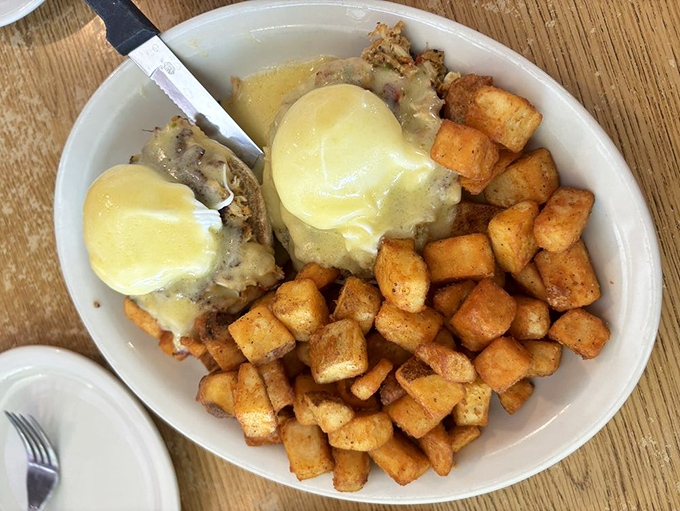 Crab cake benedict that would make Maryland jealous&mdash;sweet crabmeat crowned with poached eggs and hollandaise worthy of worship.