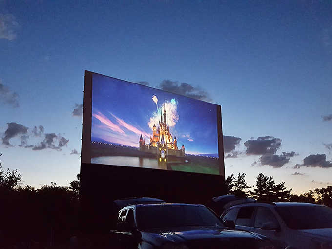 Even Mickey Mouse looks more magical when his castle appears on the massive outdoor screen, stars twinkling above both the fictional and real night sky.