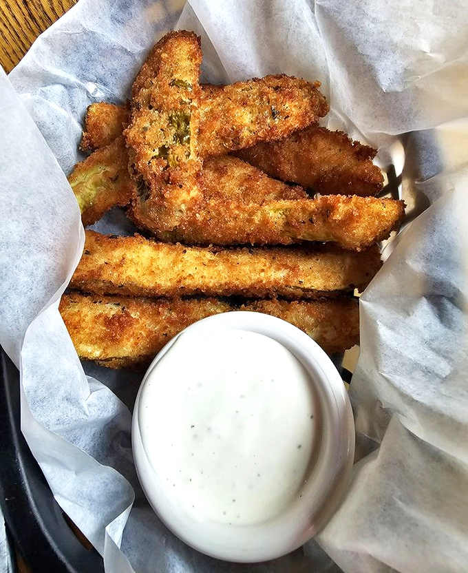 Fried pickles: Not those sad, soggy pickle chips from lesser establishments. These crunchy spears maintain their dignity even after the deep-fryer.
