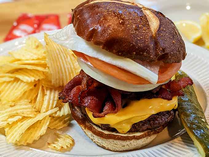 This bacon cheeseburger stacked high on a pretzel bun proves George's doesn't play favorites between breakfast and lunch excellence.