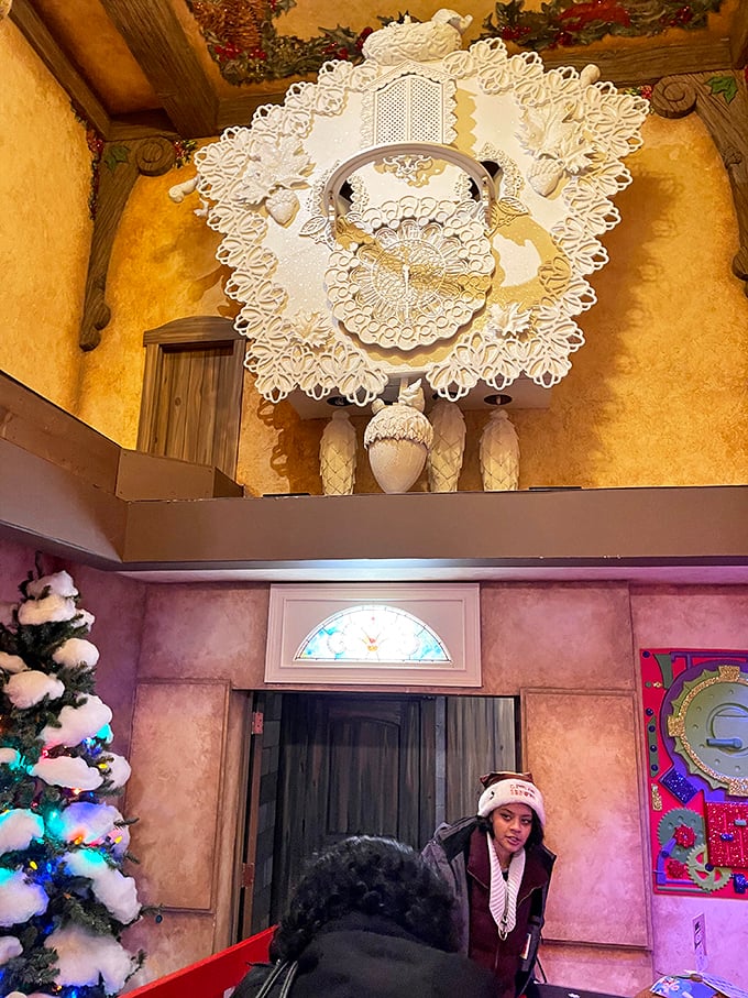 Ornate and otherworldly, this elaborate ceiling fixture looks like what might happen if aliens discovered Victorian decorative arts and added their own twist.