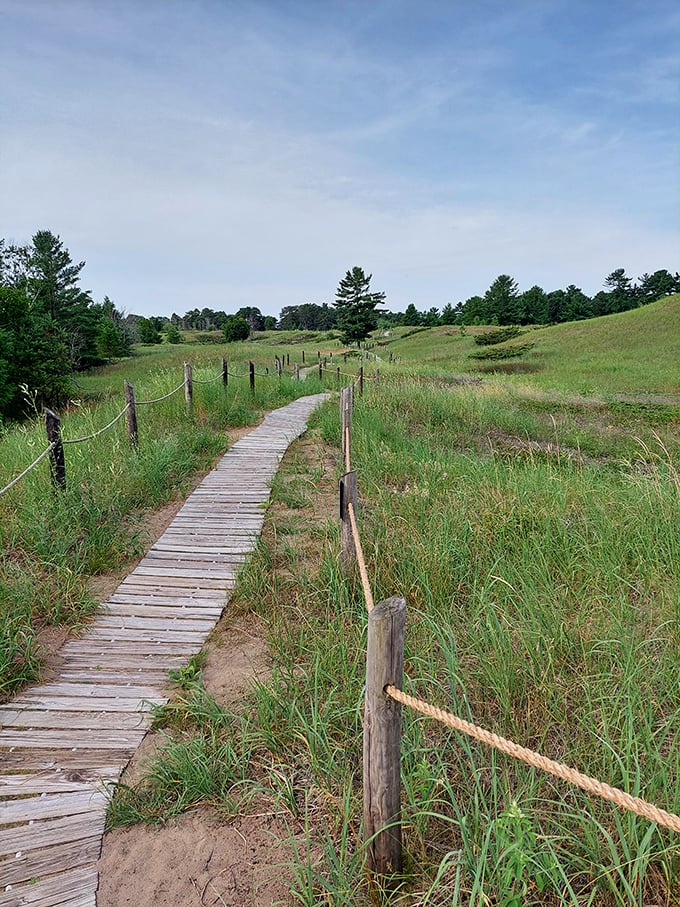 Sandy pathways meet weathered wood in this slice of Wisconsin paradise, where every step promises new discoveries beyond the dune.