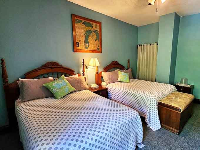 Twin beds dressed in crisp linens promise the kind of deep sleep that only comes from days spent in fresh air.