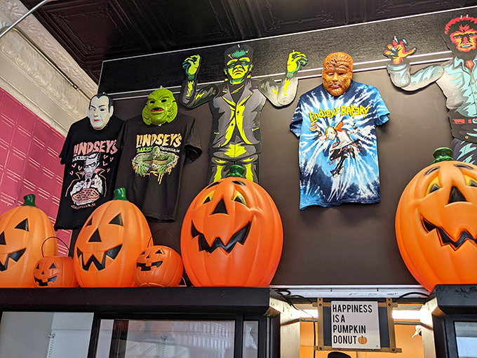 Halloween meets bakery brilliance with monster-themed merchandise that proves Lindsey's spirit extends beyond the display case to the d&eacute;cor.