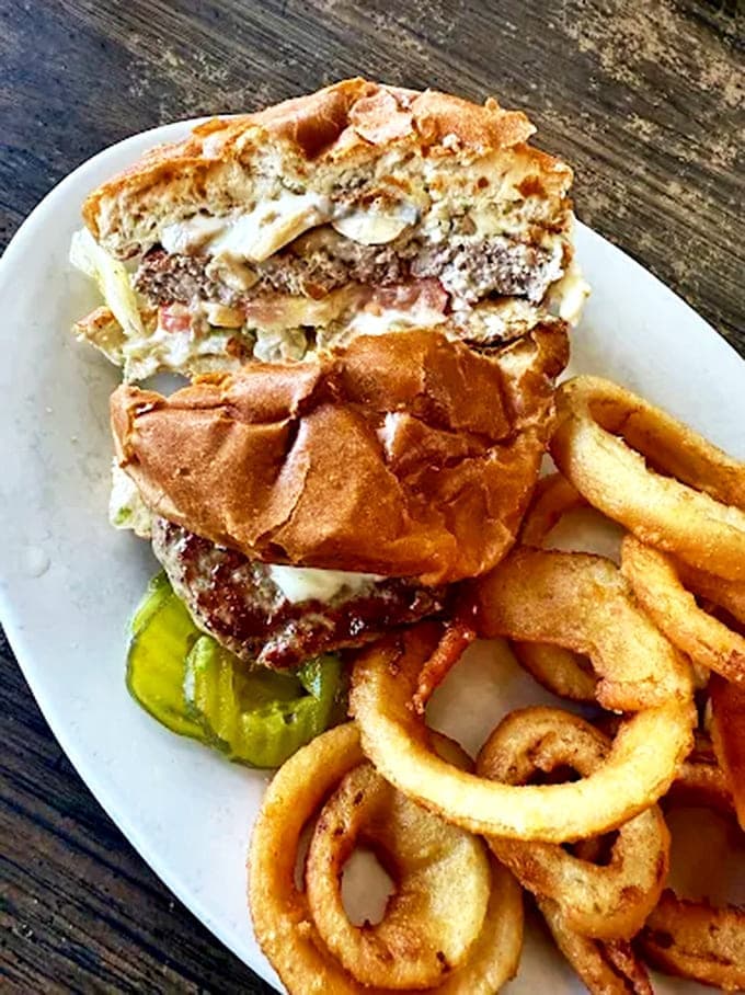 A cheeseburger so classic it could teach a masterclass in simplicity, proving that perfection doesn't need fancy toppings or complicated sauces.