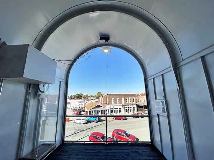 Room with a view! From inside the giant mailbox, Casey's main street becomes a living postcard framed by this quirky architectural marvel.