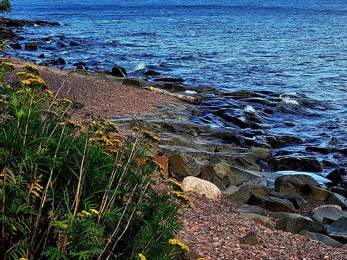 The meeting point of forest and shore creates a perfect frame for Lake Superior's vastness &ndash; nature's own masterpiece.