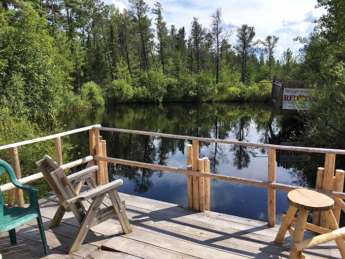 Lakeside serenity awaits at this rustic fishing dock. Bet the fish stories told here are as old as the hills.