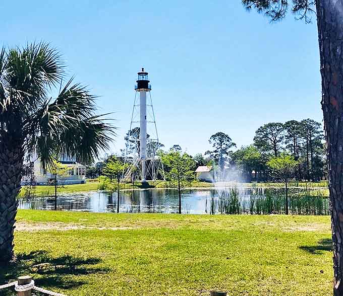 Across the reflecting pond, the lighthouse complex creates mirror images that make photographers weak in the knees with compositional possibilities.