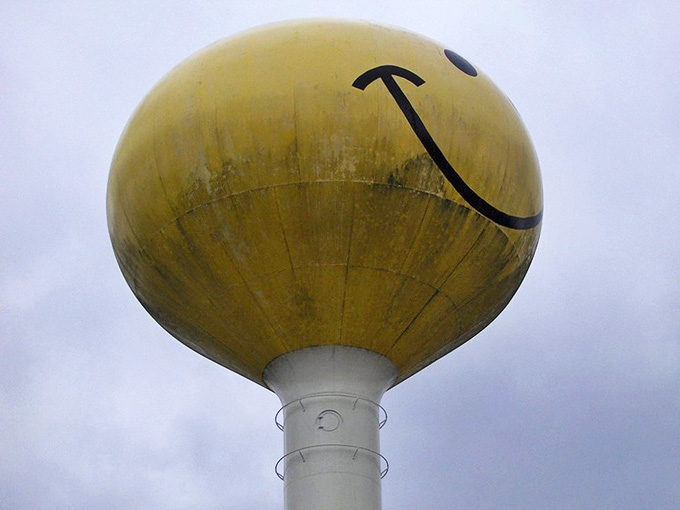 Looking up at this cheerful colossus, it's impossible not to wonder &ndash; is it smiling at us, or at some cosmic joke only water towers understand?