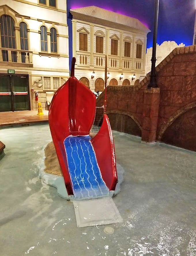 This crimson chariot of childhood joy delivers pint-sized adventurers into waiting waters with just enough splash to feel daring.