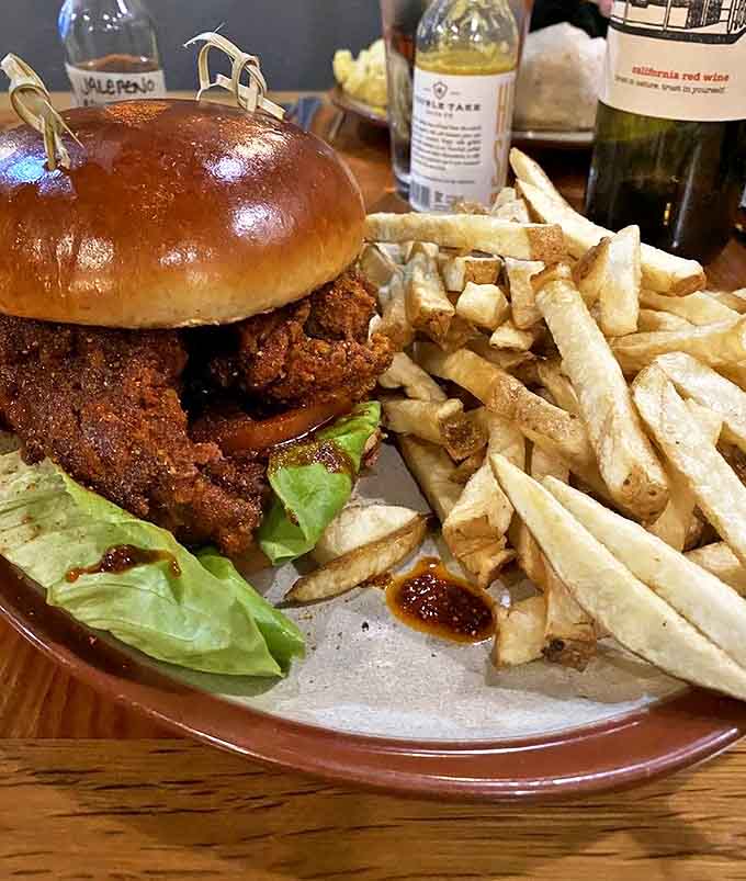 The legendary Nashville Hot Chicken Sandwich &ndash; crispy, fiery perfection on a bun with house-made pickles to cut through the heat.