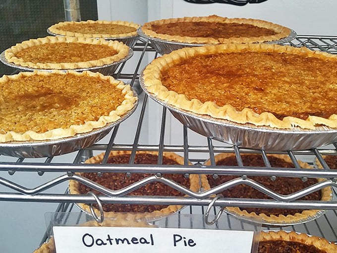 Oatmeal pies cooling on the rack &ndash; their crumbly tops hiding the sweet, gooey treasure beneath like edible treasure chests.