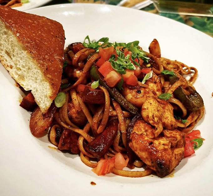 Pastalaya brings New Orleans flair to the rainforest, a spicy medley of noodles, chicken, and shrimp that's hotter than a tropical afternoon.