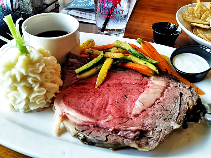 Prime rib perfection &ndash; a generous cut of slow-roasted beef served with seasonal vegetables and that magical au jus.