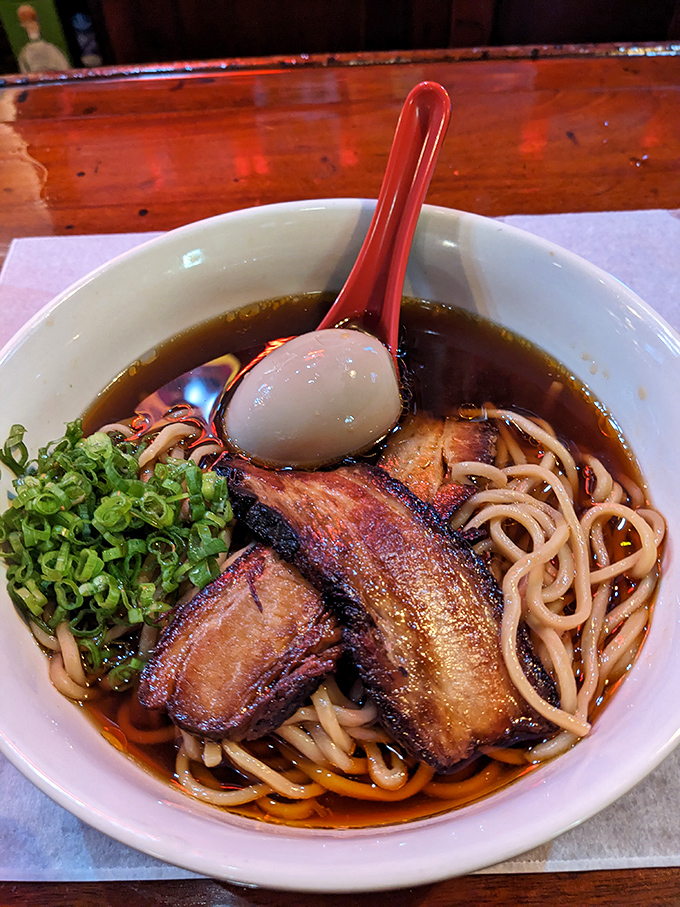 An unexpected twist! Tender pork belly, perfectly jammy egg, and fresh scallions transform this humble bar into a surprising ramen destination.