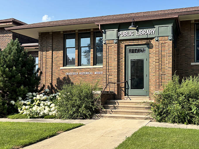 Knowledge and nostalgia share shelf space in this brick sanctuary, where local history breathes alongside contemporary literature.