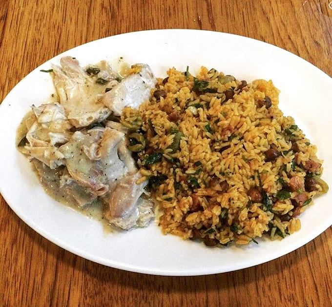 Succulent pulled chicken alongside seasoned rice &ndash; proof that simplicity, when executed perfectly, creates the most profound flavors.