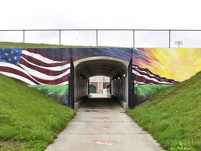 Raney Street overpass: A colorful tunnel connecting neighborhoods, where patriotic murals transform an ordinary underpass into a community canvas.