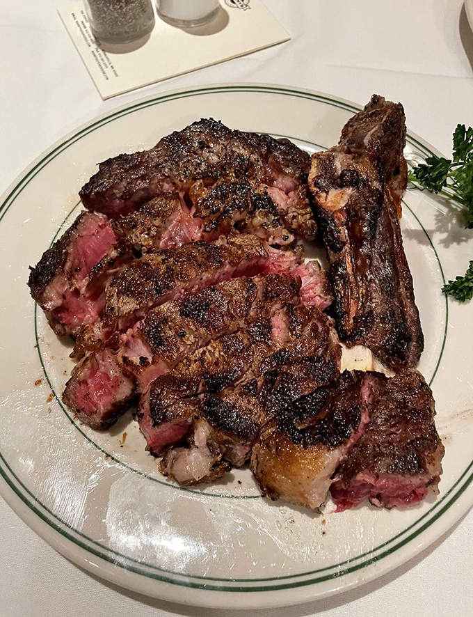 Behold the ribeye in all its glory &ndash; sliced to reveal that perfect pink interior that makes meat lovers weak at the knees.