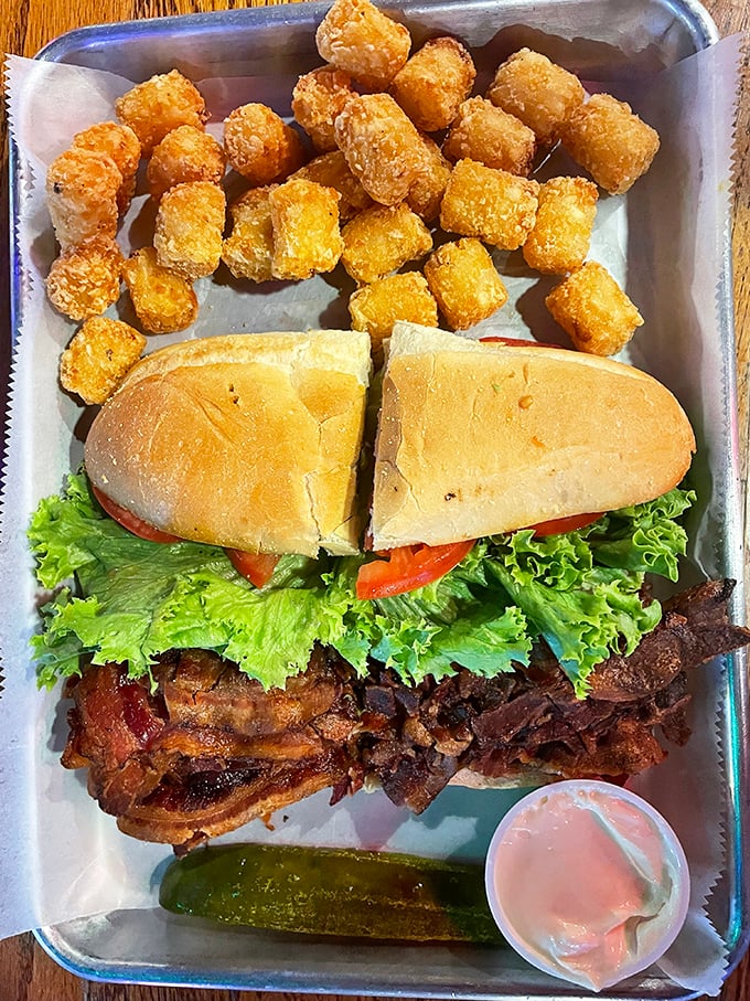 Pulled pork piled high with crispy tater tots&mdash;a meal that demands both hands and zero regrets.
