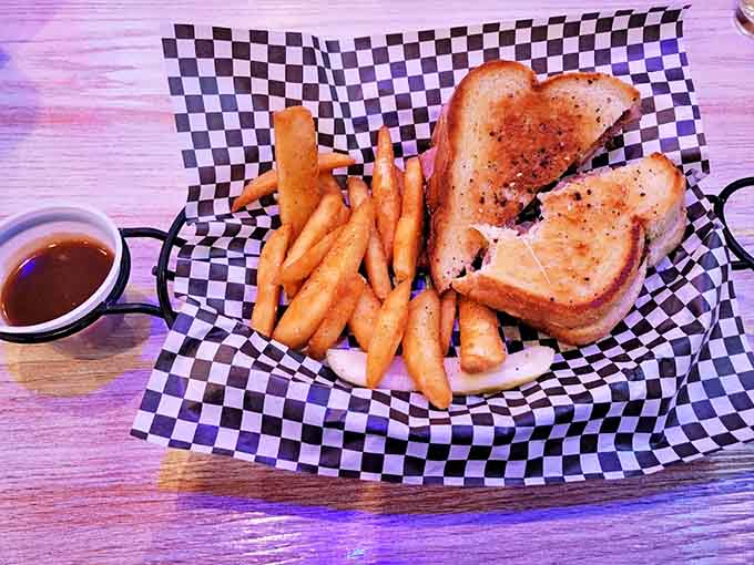 A perfectly grilled sandwich shares the spotlight with golden fries &ndash; a classic duo that never goes out of style.