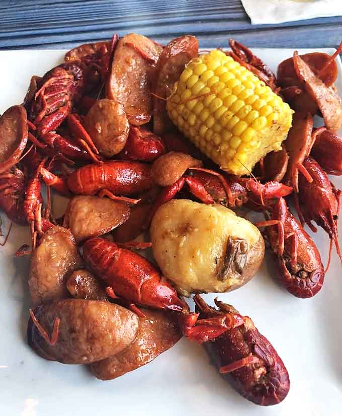 A proper seafood boil isn't just dinner &ndash; it's an event! Crawfish, potatoes, corn, and sausage create a communal feast worth rolling up sleeves for.