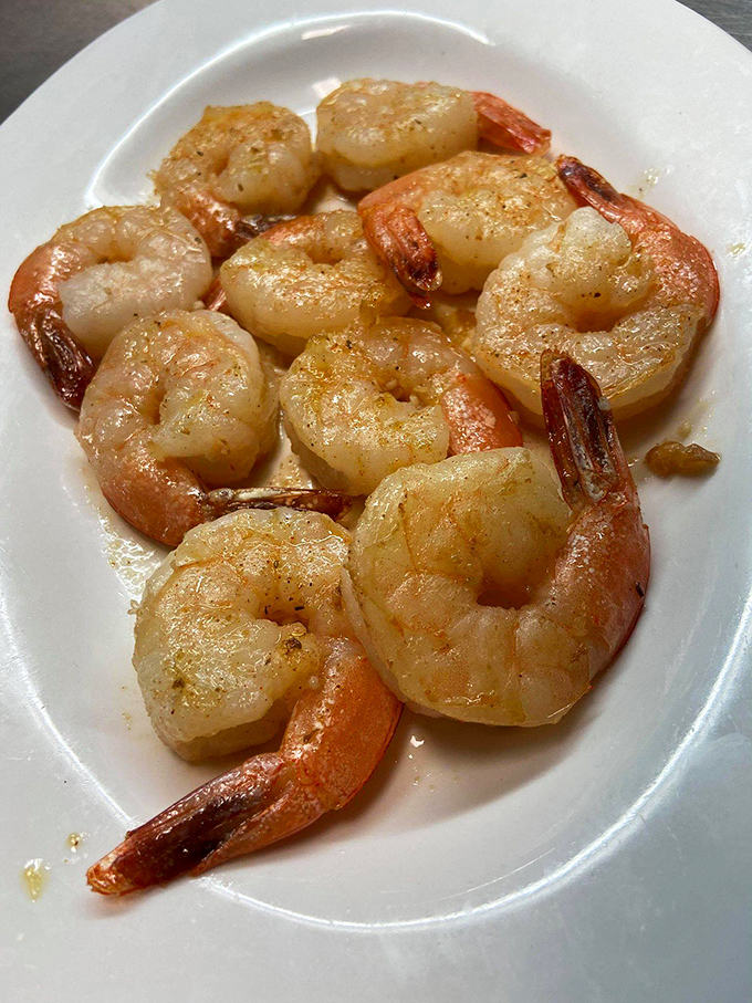 Plump, succulent shrimp cooked to perfection, glistening with butter and ready to transport you to seafood heaven.