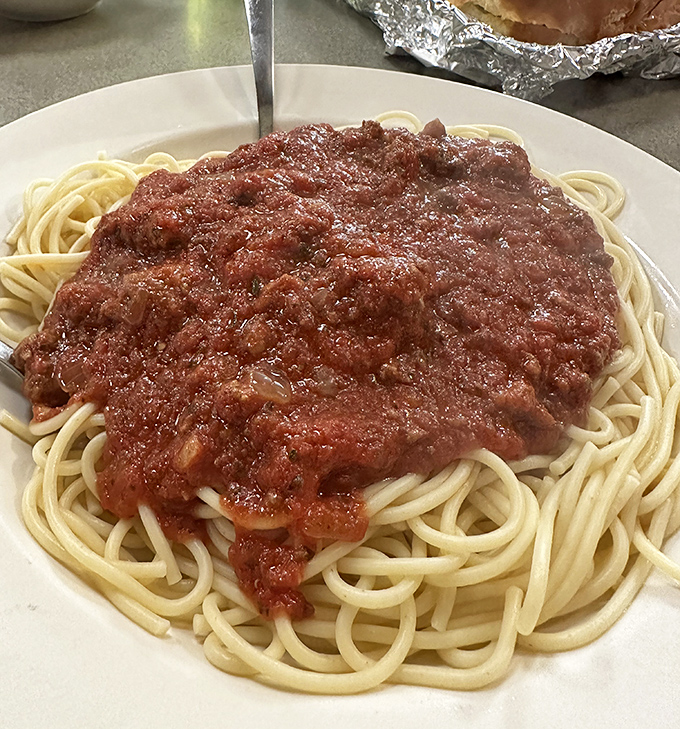 Spaghetti that would make an Italian grandmother nod in approval, with sauce that demands to be sopped up with garlic bread.