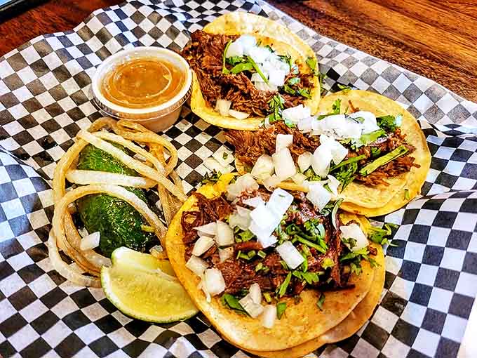 Street tacos done right &ndash; simple corn tortillas cradle perfectly seasoned meat, topped with fresh cilantro and onion, with lime wedges standing by for that crucial squeeze.