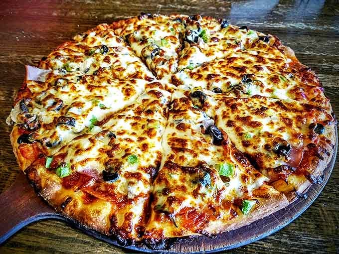 Loaded with toppings that somehow stay perfectly balanced, their supreme pizza defies the laws of both physics and flavor.