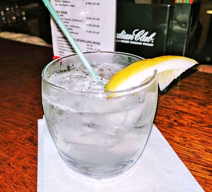 A simple lemon wedge transforms ordinary water into something worth savoring between sips of something stronger.